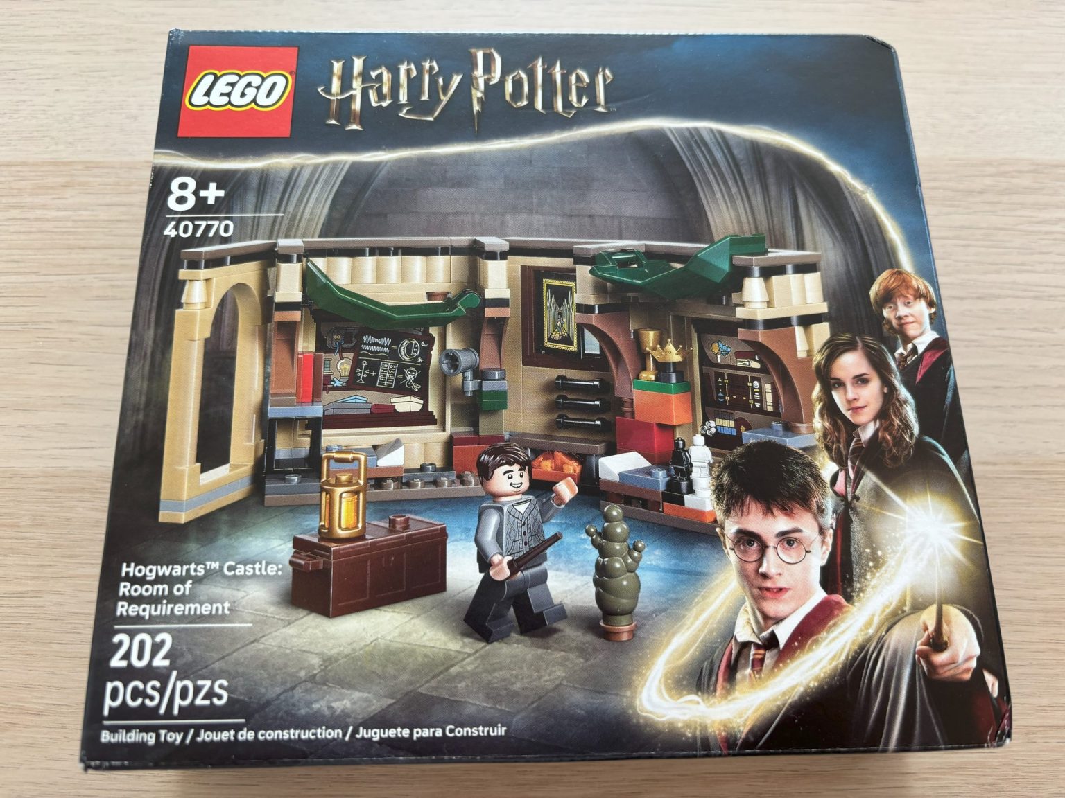 The back of the box shows that the set can be folded into a room or ...