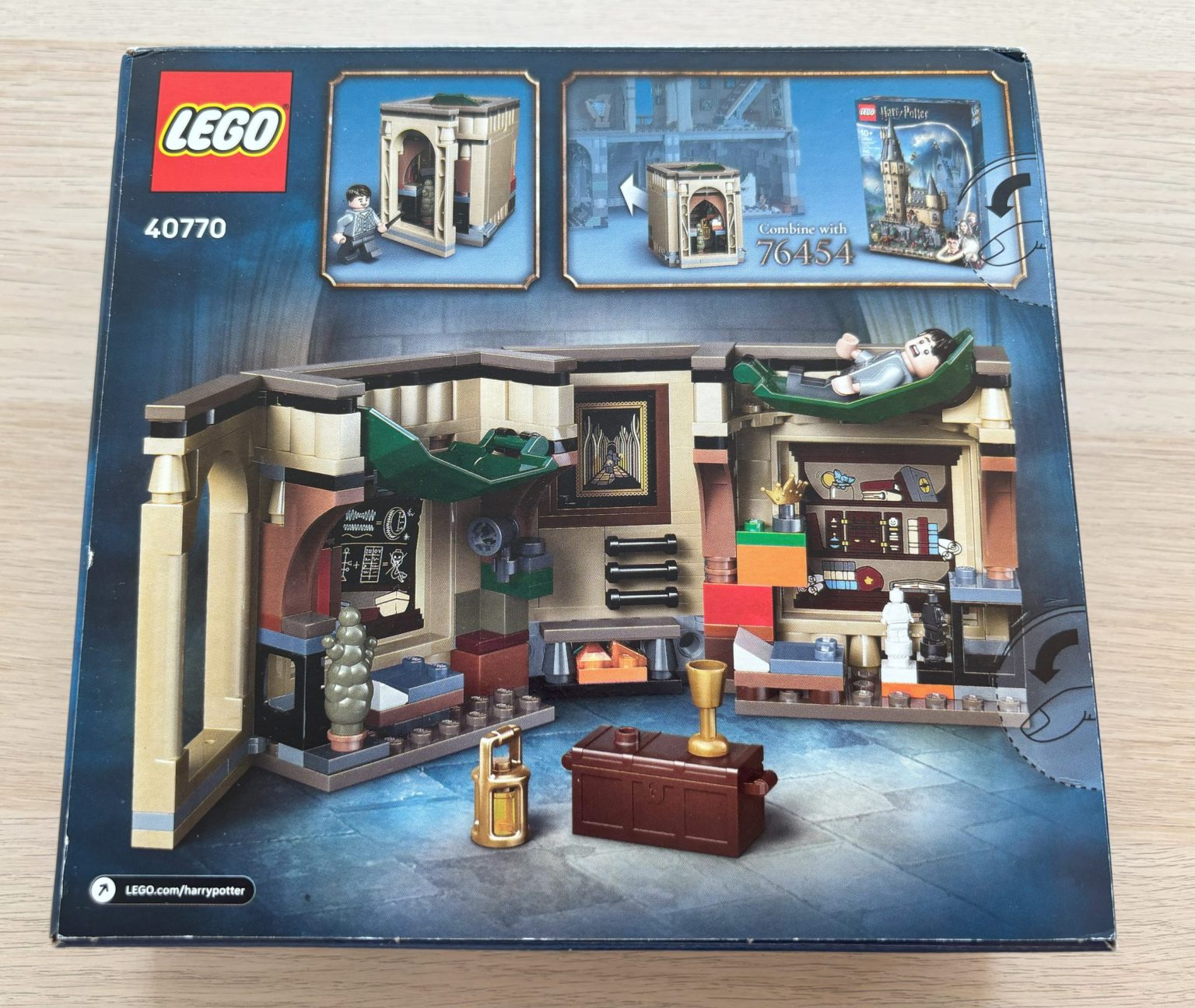 The top of the box features an image of the included minifigure ...
