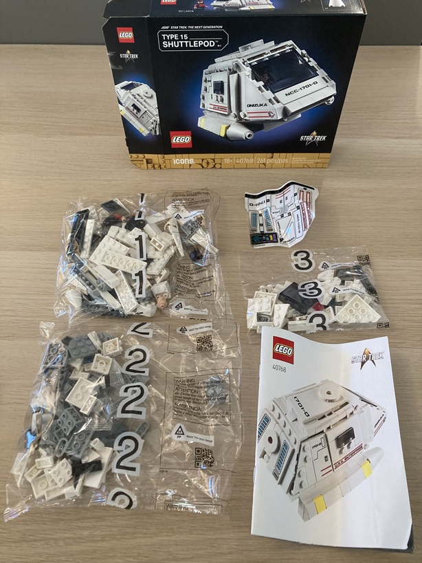 Here’s a closer look at the sticker sheet as well as the instructions booklet.